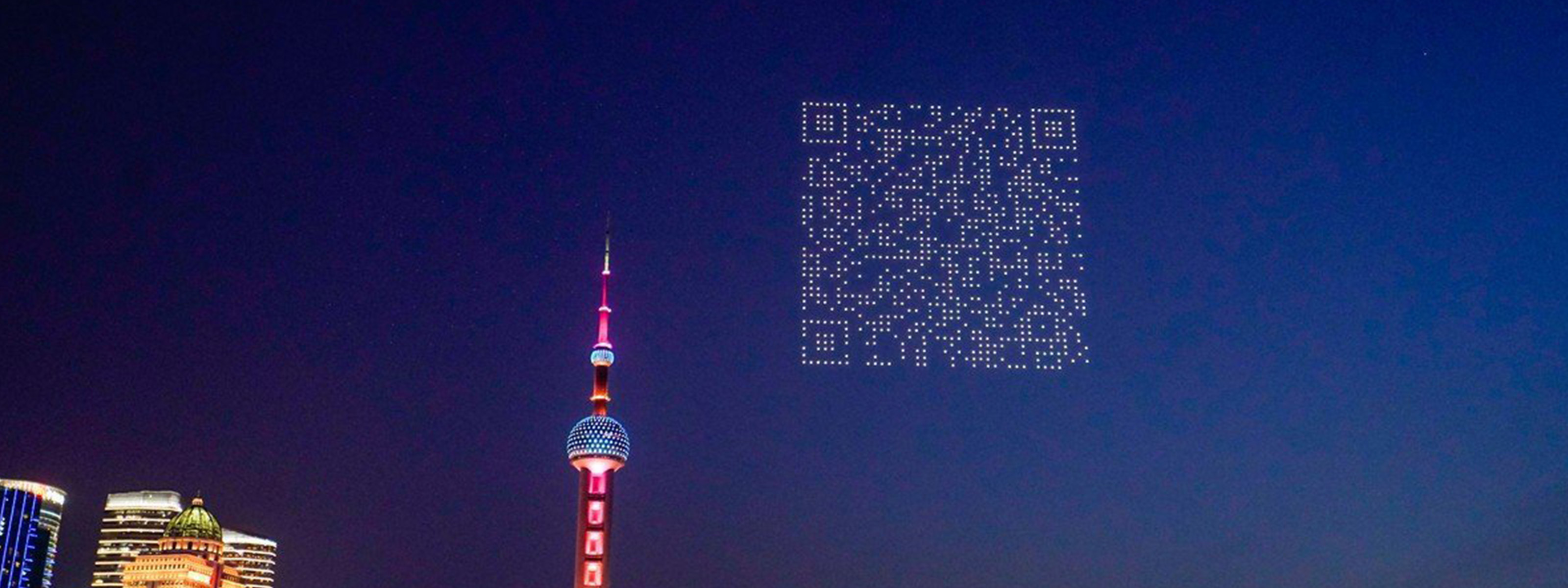Drone light show creates scannable QR code in the sky
