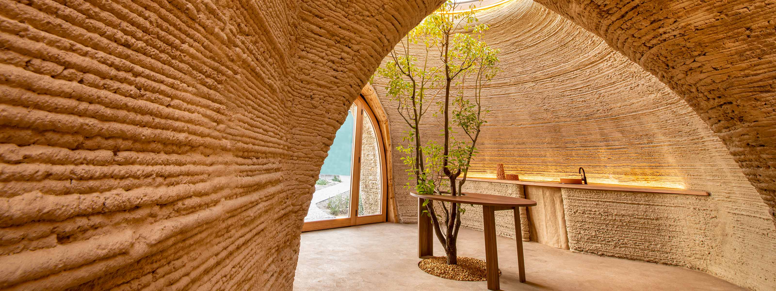 The first 3D-printed house made with dirt