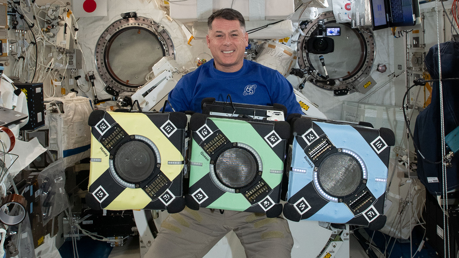 Watch NASA’s flying space bots work alongside astronauts