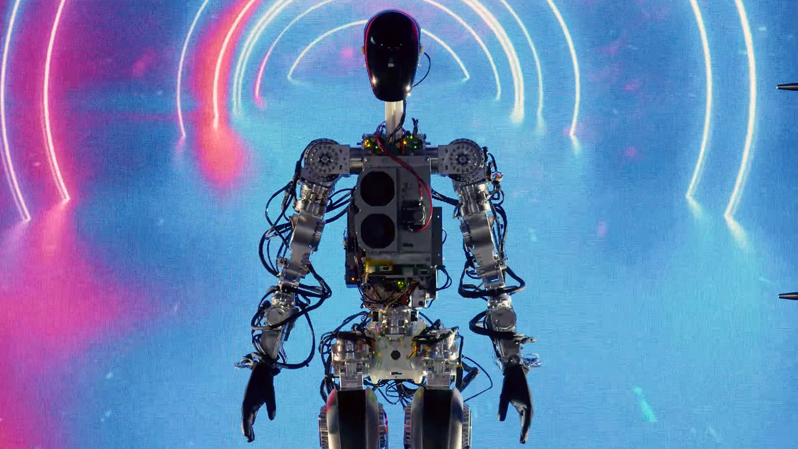 Elon Musk demos humanoid Tesla robot, which will cost